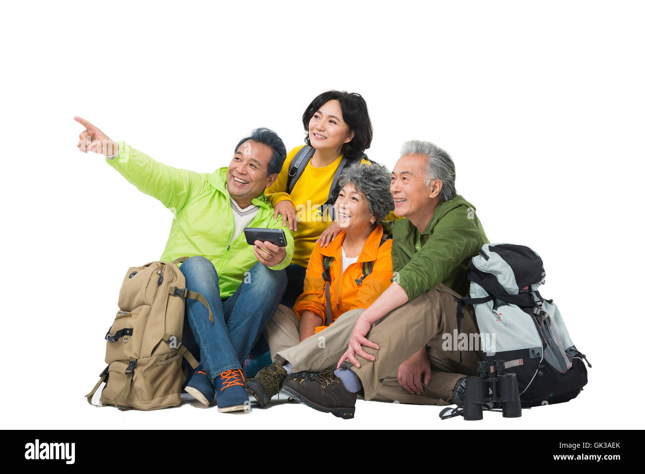 Four elderly people sitting together rest Stock Photo - Alamy