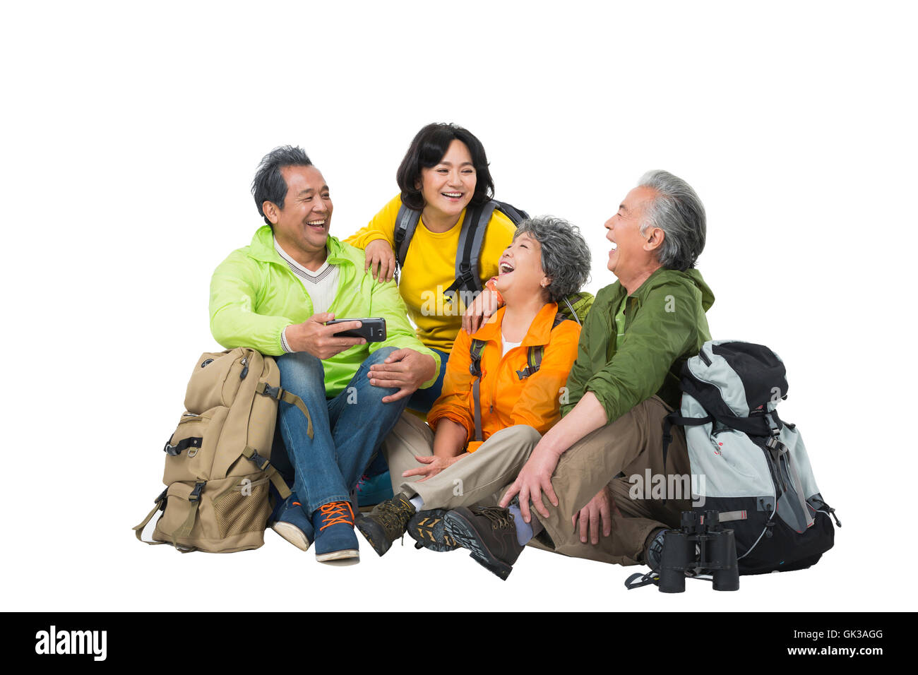 Four elderly people sitting together rest Stock Photo - Alamy