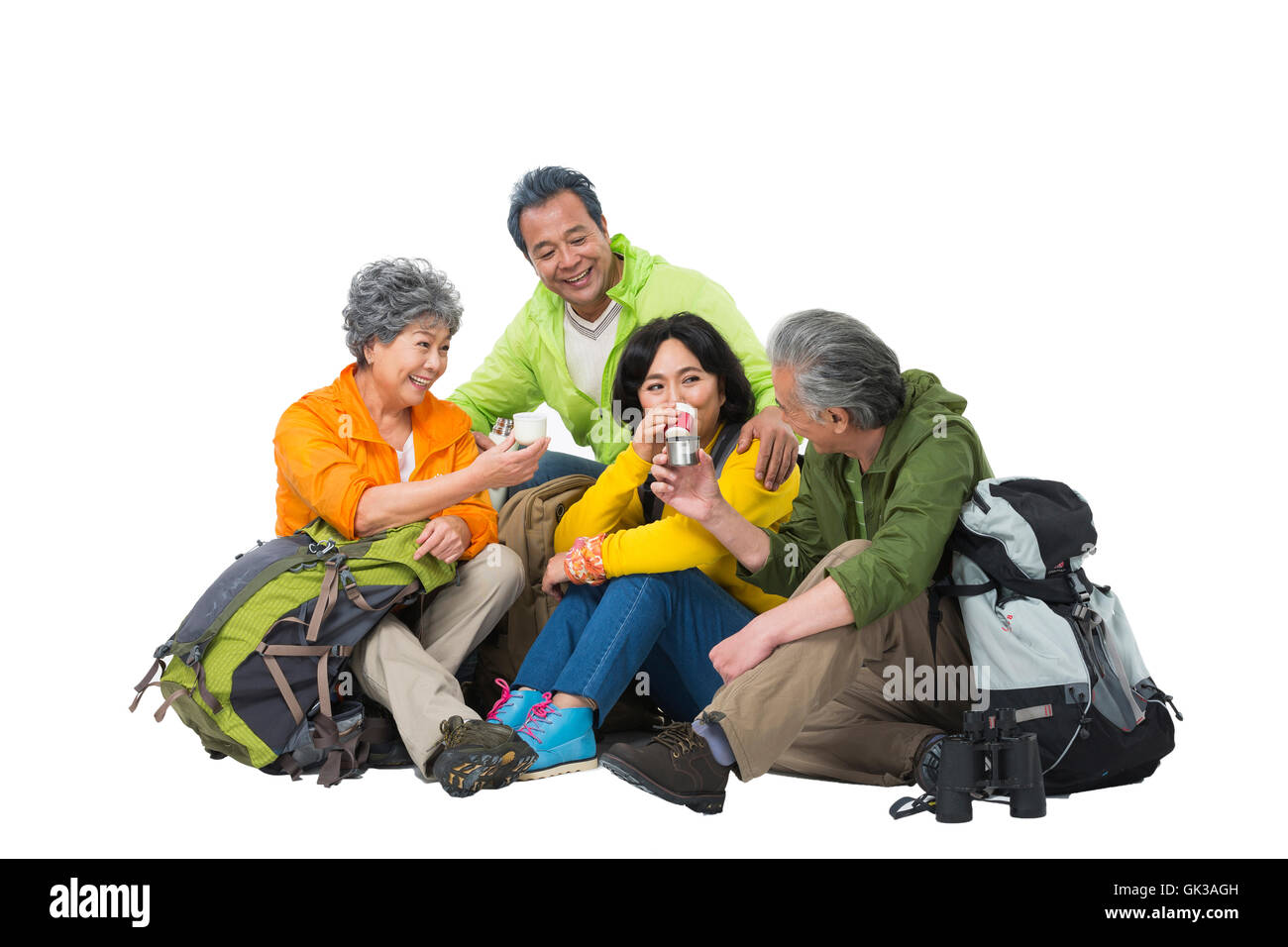 Four women sitting close together Cut Out Stock Images & Pictures - Alamy
