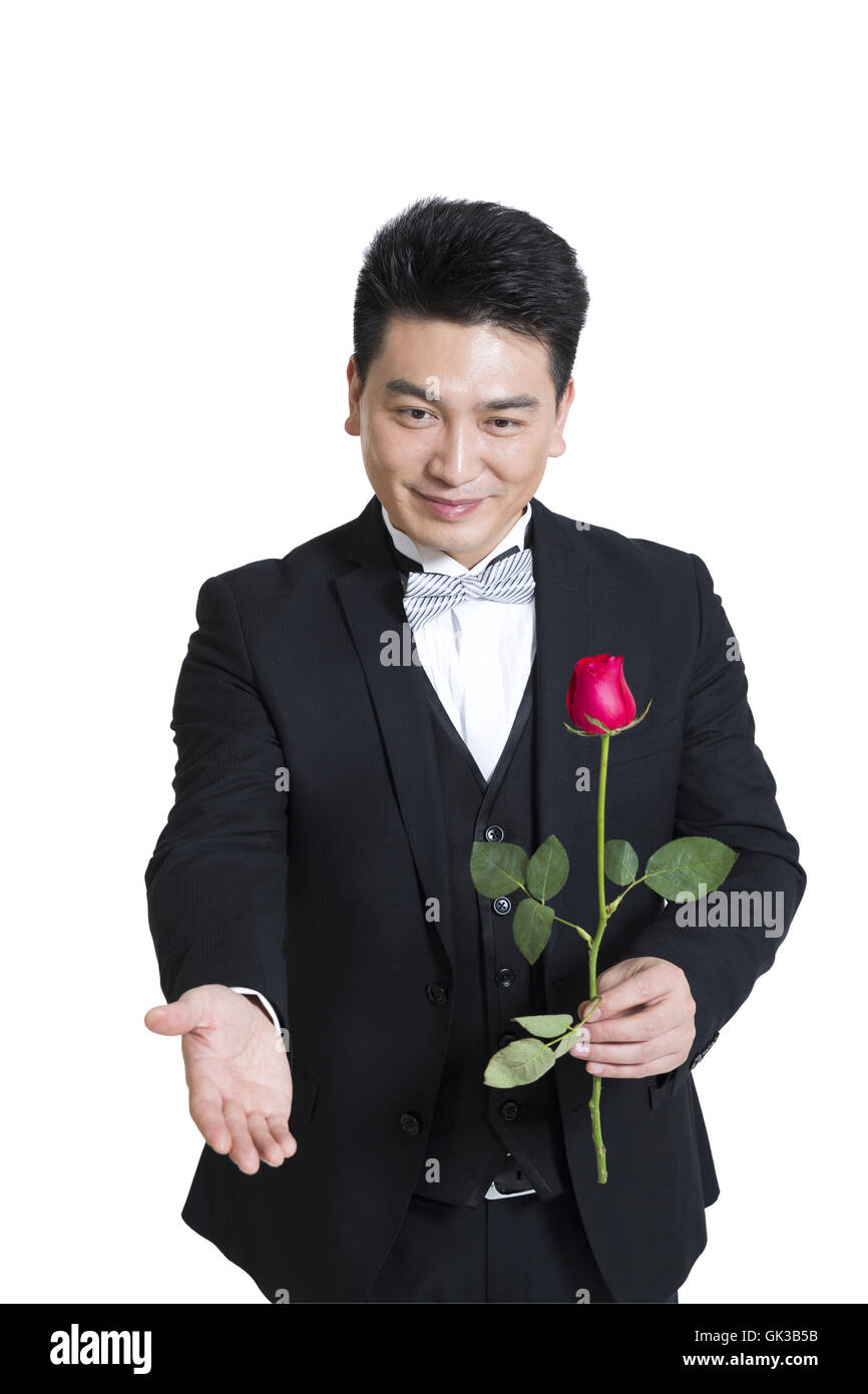 Studio shot business men and roses Stock Photo - Alamy