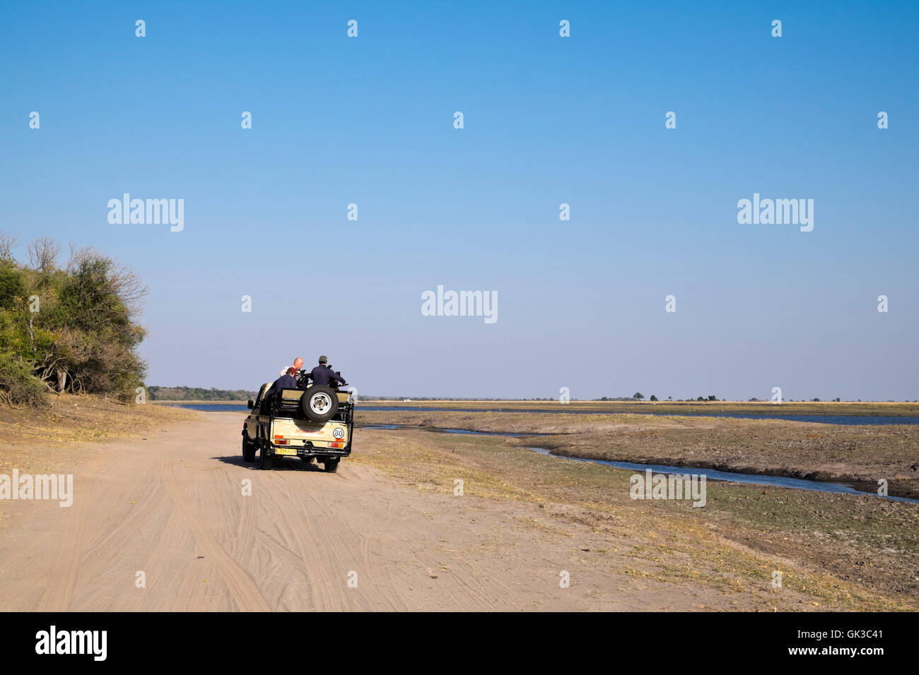 A film crew filming in Chobe national park Botswana Stock Photo - Alamy