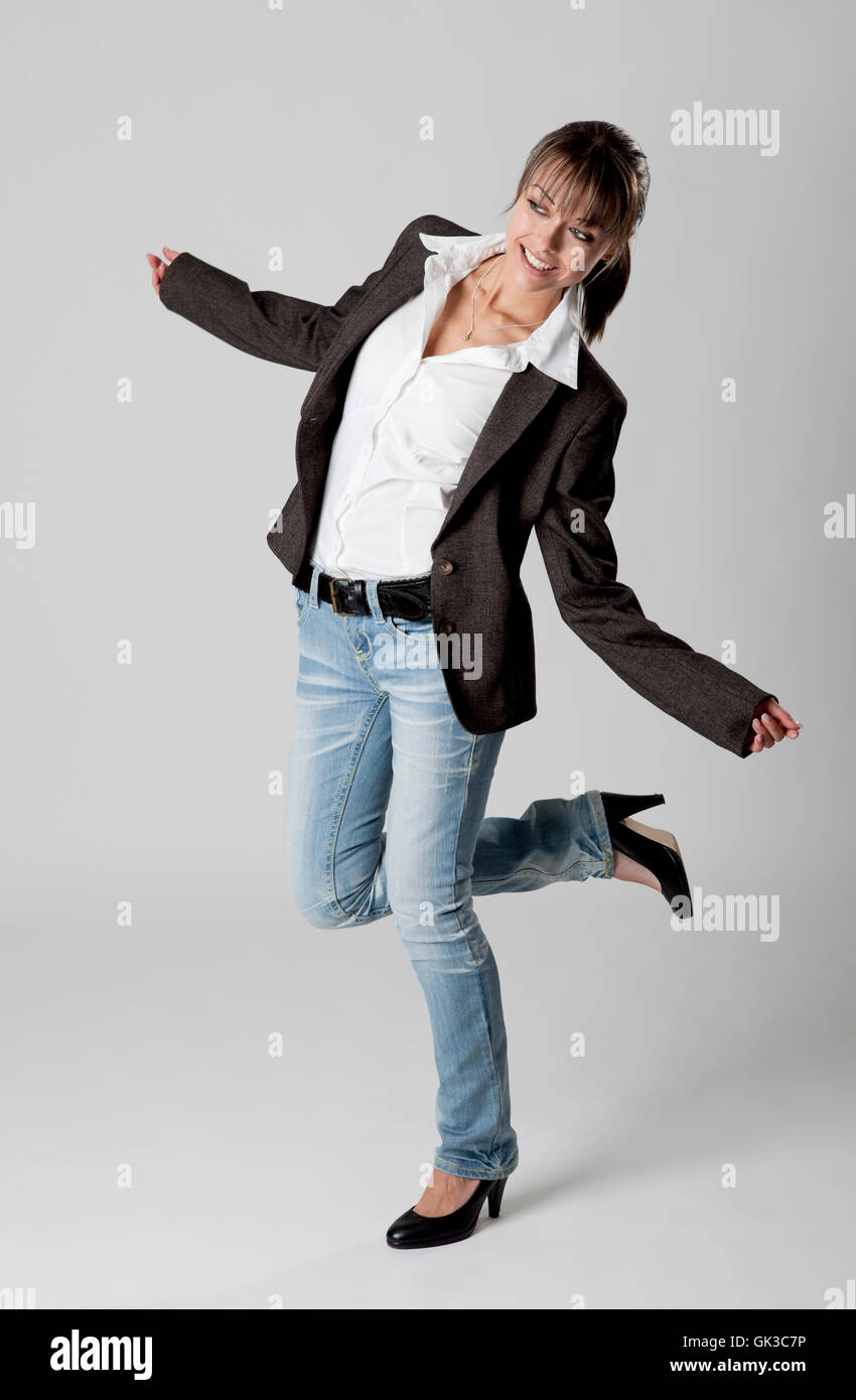 young woman balancing on one leg Stock Photo - Alamy