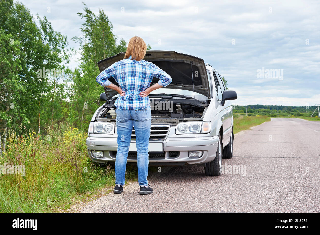 Woman hood car hi-res stock photography and images - Alamy