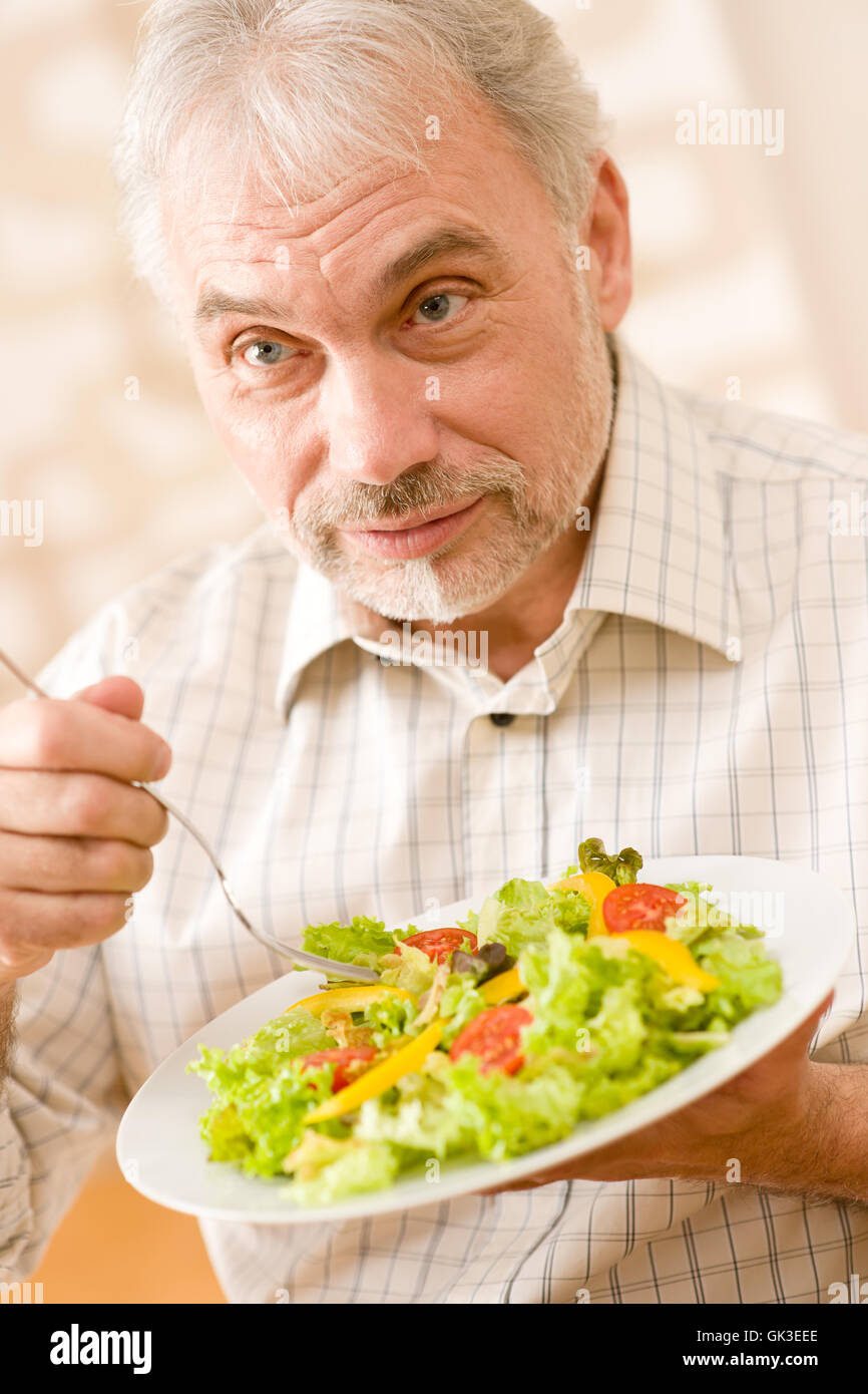 Old man eating dinner alone hi-res stock photography and images - Alamy