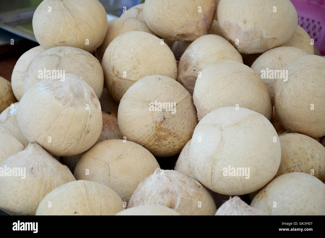 Coconut juice and coconut water packing thai style for sale at local ...
