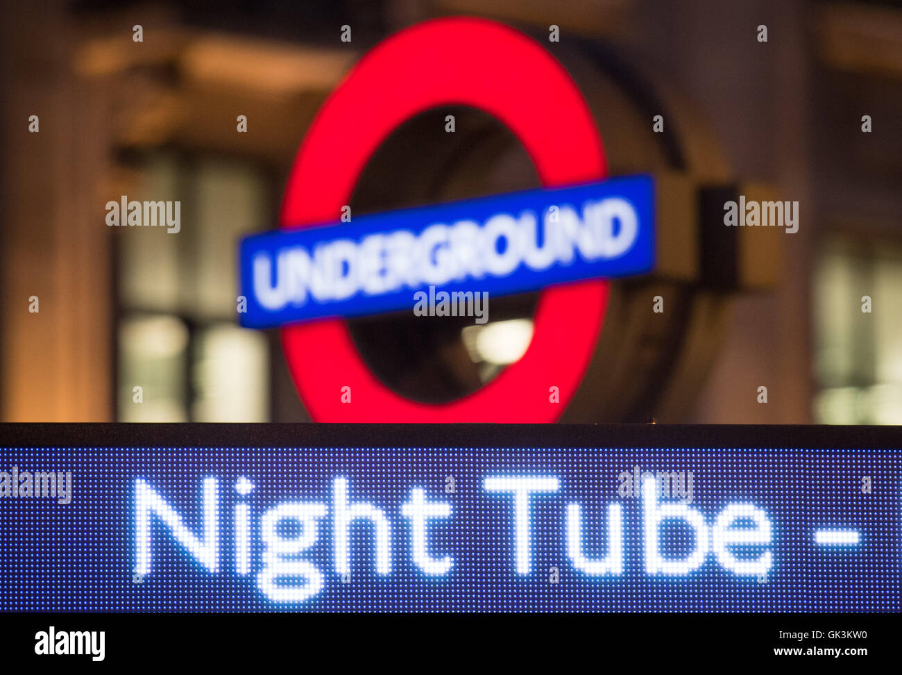 A London Underground roundel alongside an advert for the night tube at ...