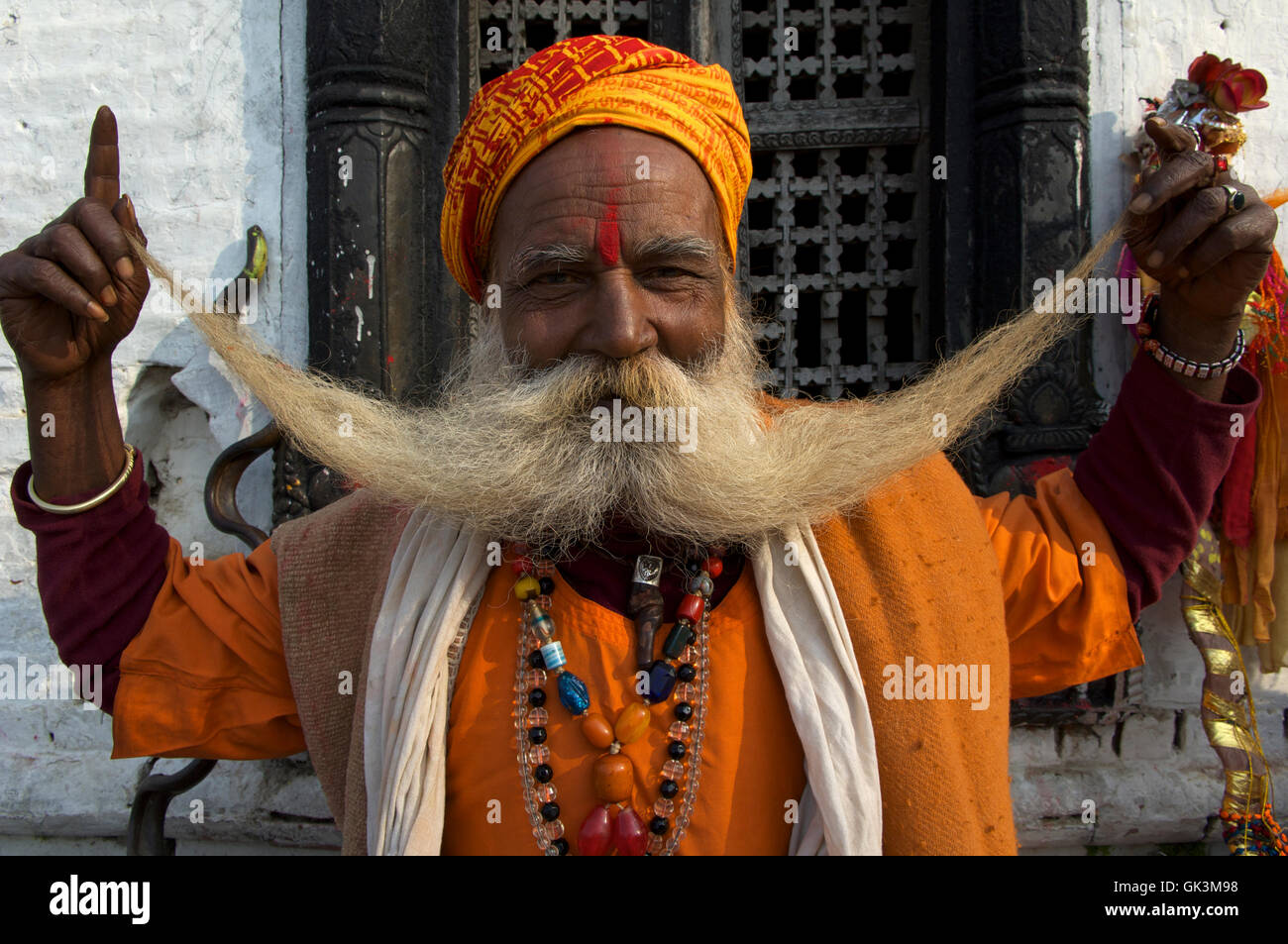 Kathmandu, Nepal --- Sadhu, or holy man, showing off his long moustache ...