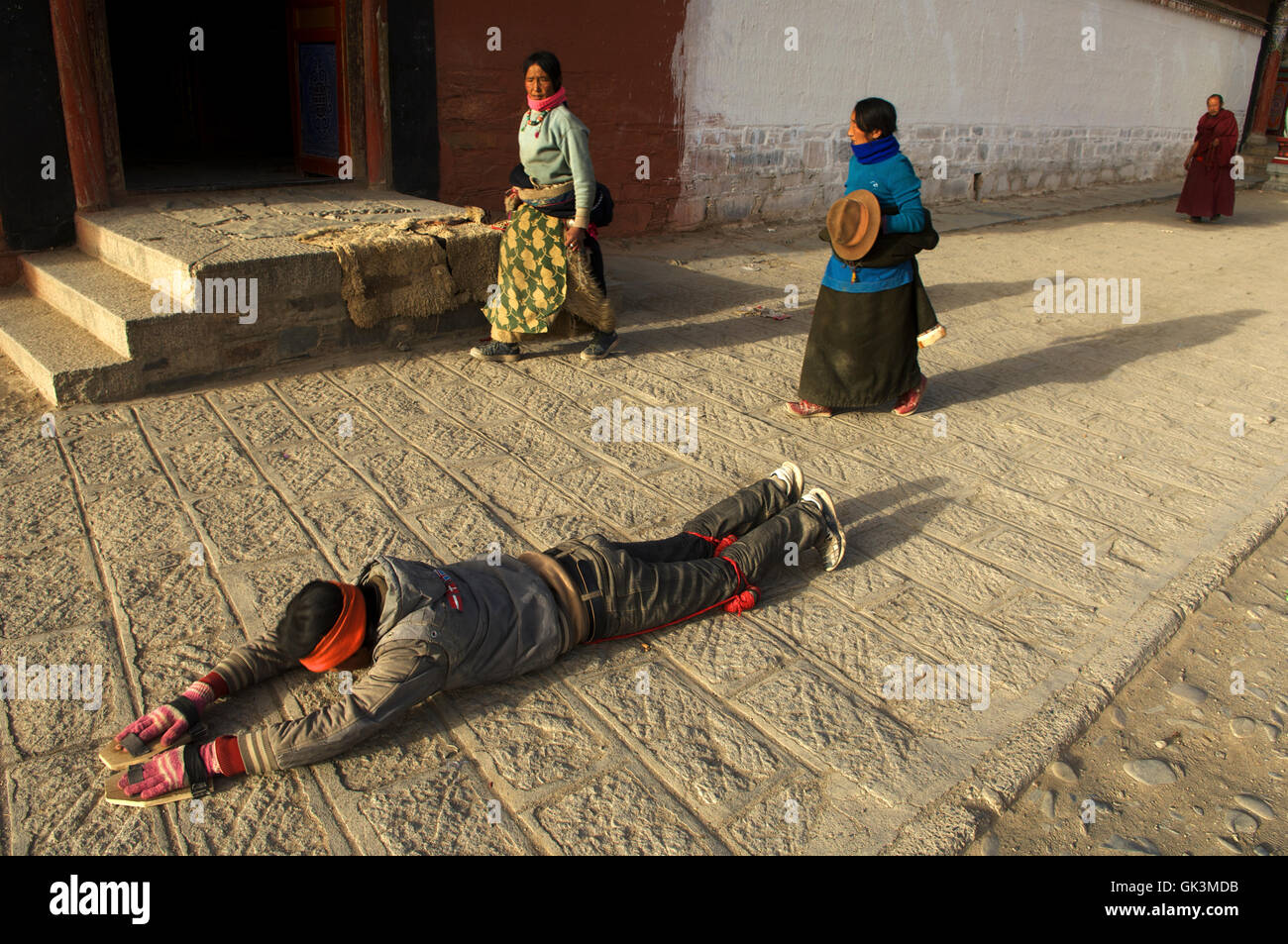 Xiahe, Gansu Province, China --- Pilgrims circumambulate Labrang ...