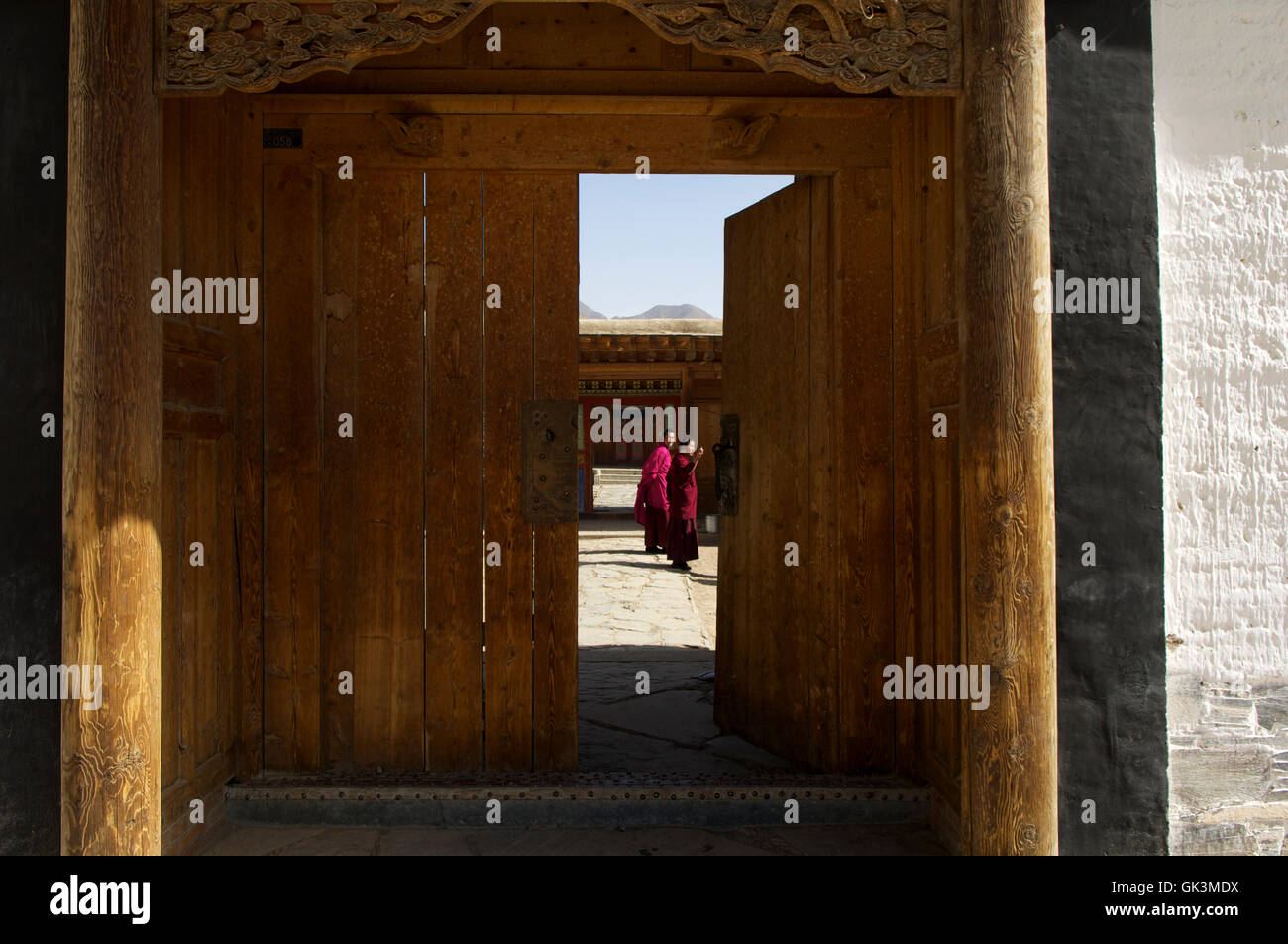 Xiahe, Gansu Province, China --- Pilgrims circumambulate Labrang ...