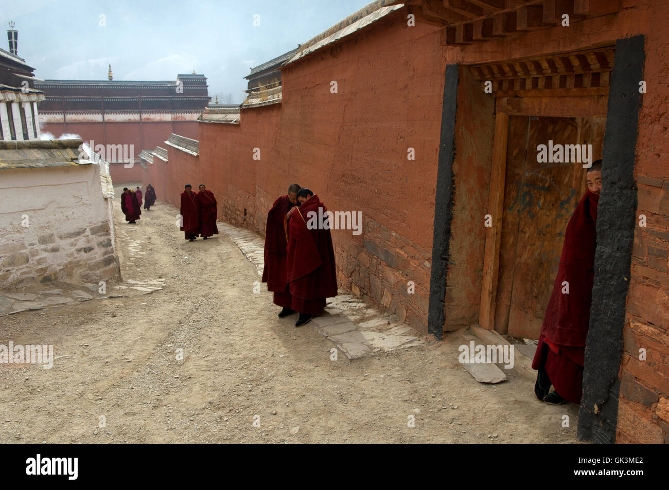 Xiahe, Gansu Province, China --- Pilgrims circumambulate Labrang ...