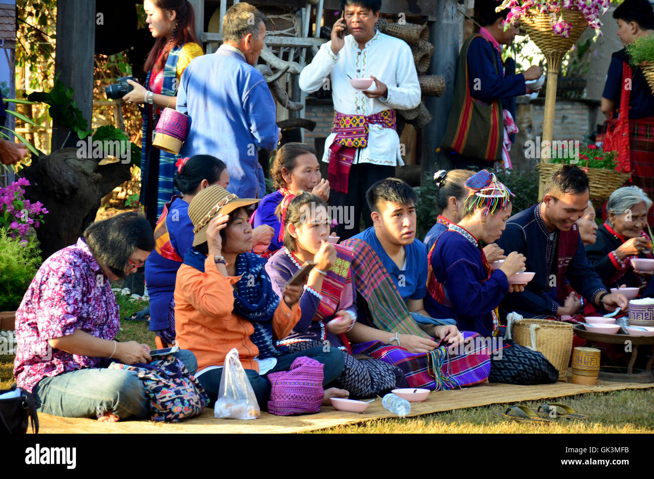 Phu Tai people sit and eat breakfast after join in phutai day festival ...