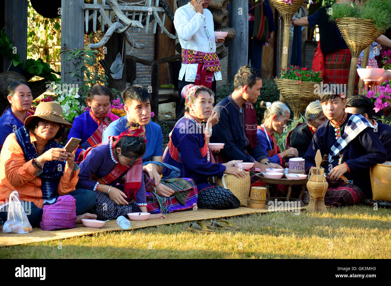 Phu Tai people sit and eat breakfast after join in phutai day festival ...