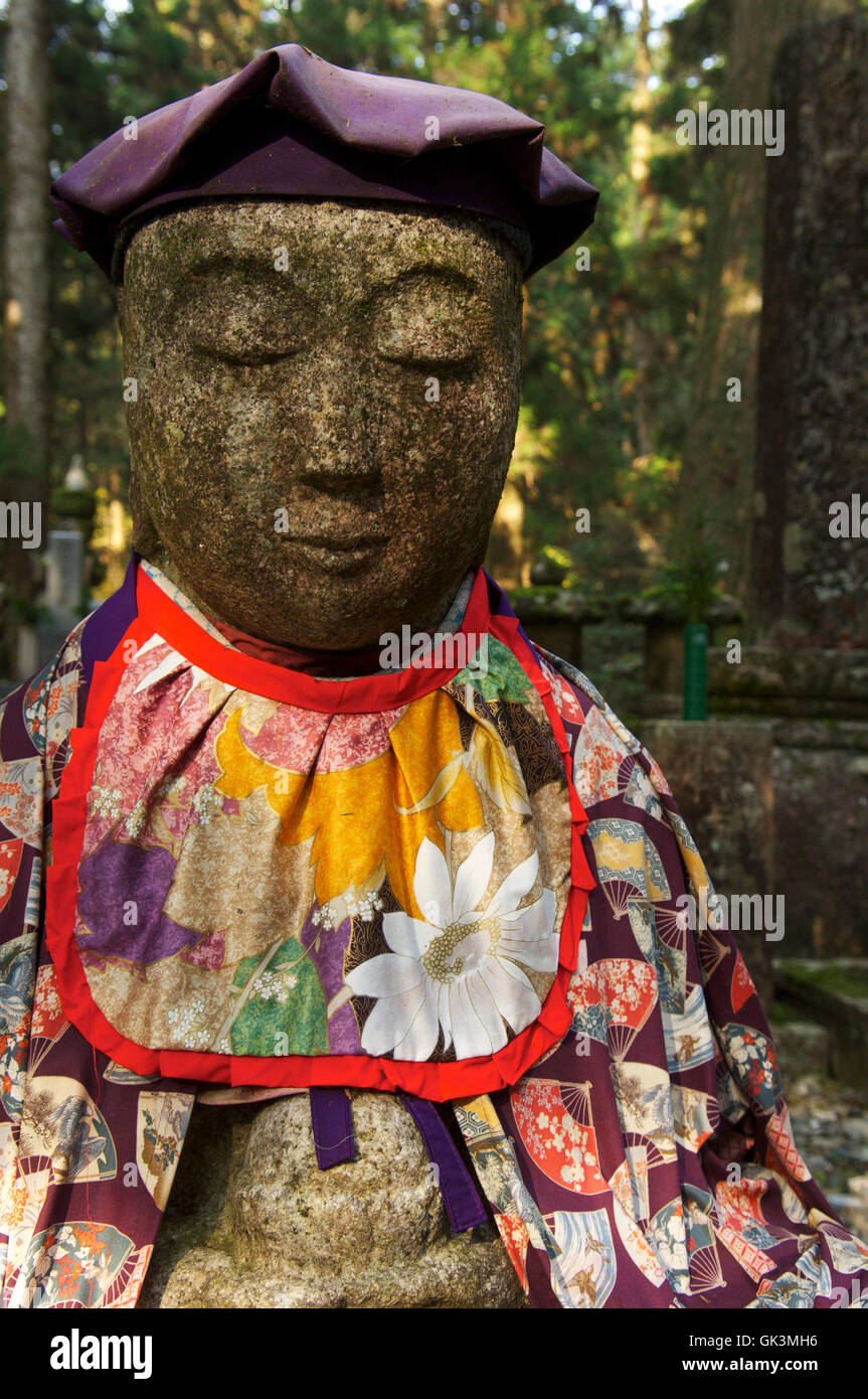 KÙyasan, Japan --- Red-bibbed statues (red expels demons according to ...