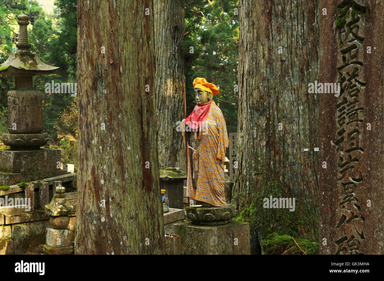 KÙyasan, Japan --- Red-bibbed statues (red expels demons according to ...