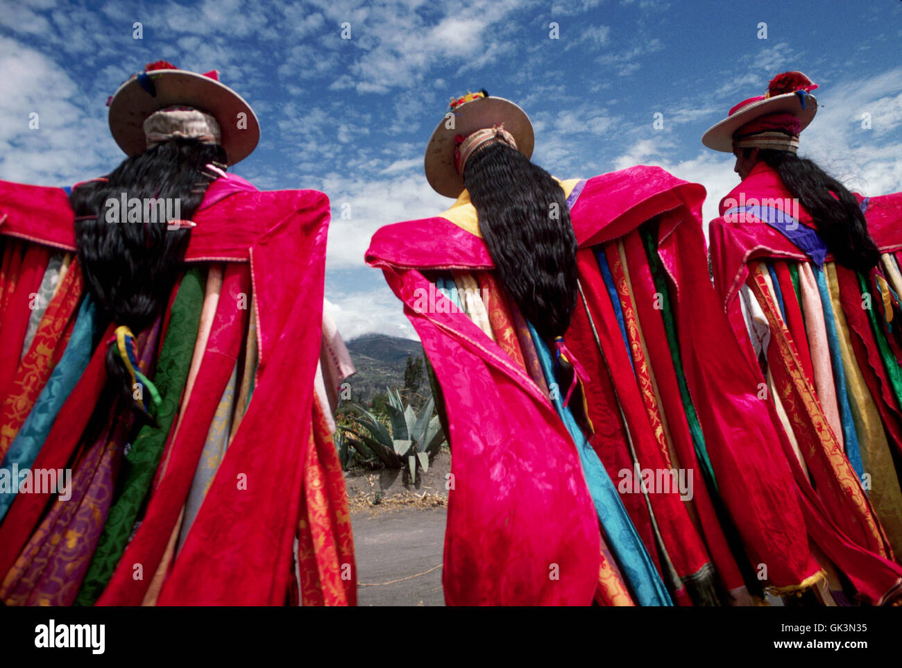 ca. 1980-1995, Salasaca, Ecuador --- Dancers dressed in bright costumes ...