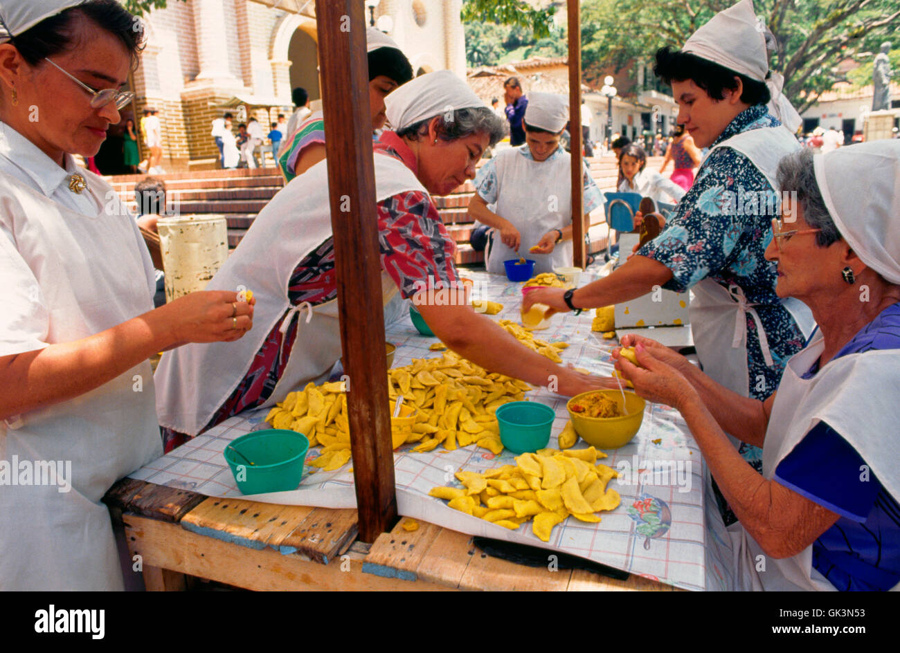 ca. 1980-1995, Colombia --- A group of women prepare empanadas. Bolivar ...