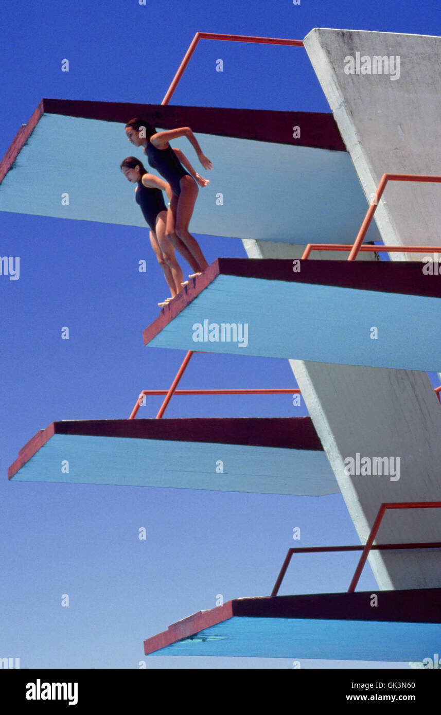 Girls Stand on Diving Board --- Image by © Jeremy Horner Stock Photo ...
