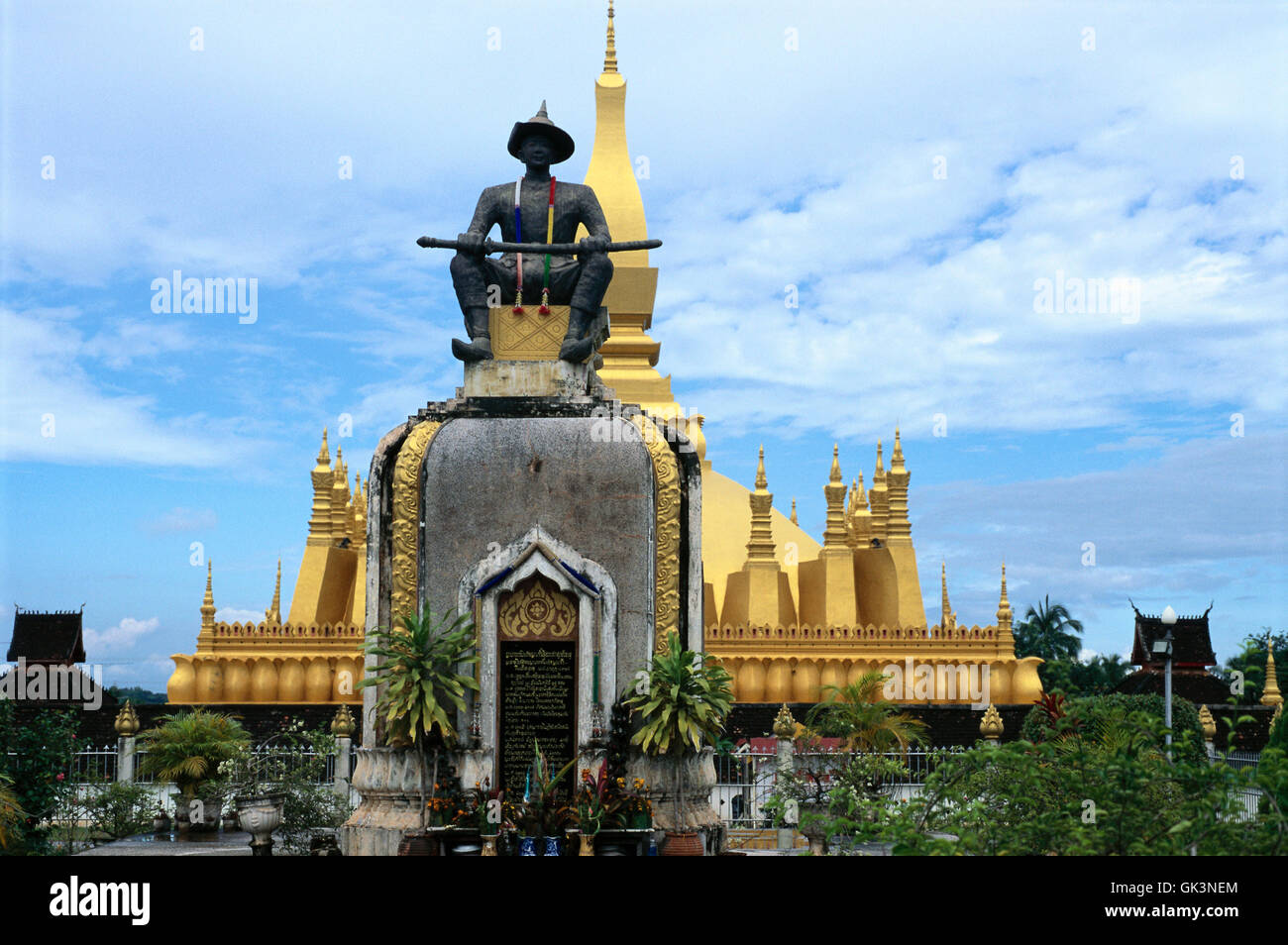 ca. 1990 - 2000, Vientiane, Laos --- A statue of King Setthathirat sits ...