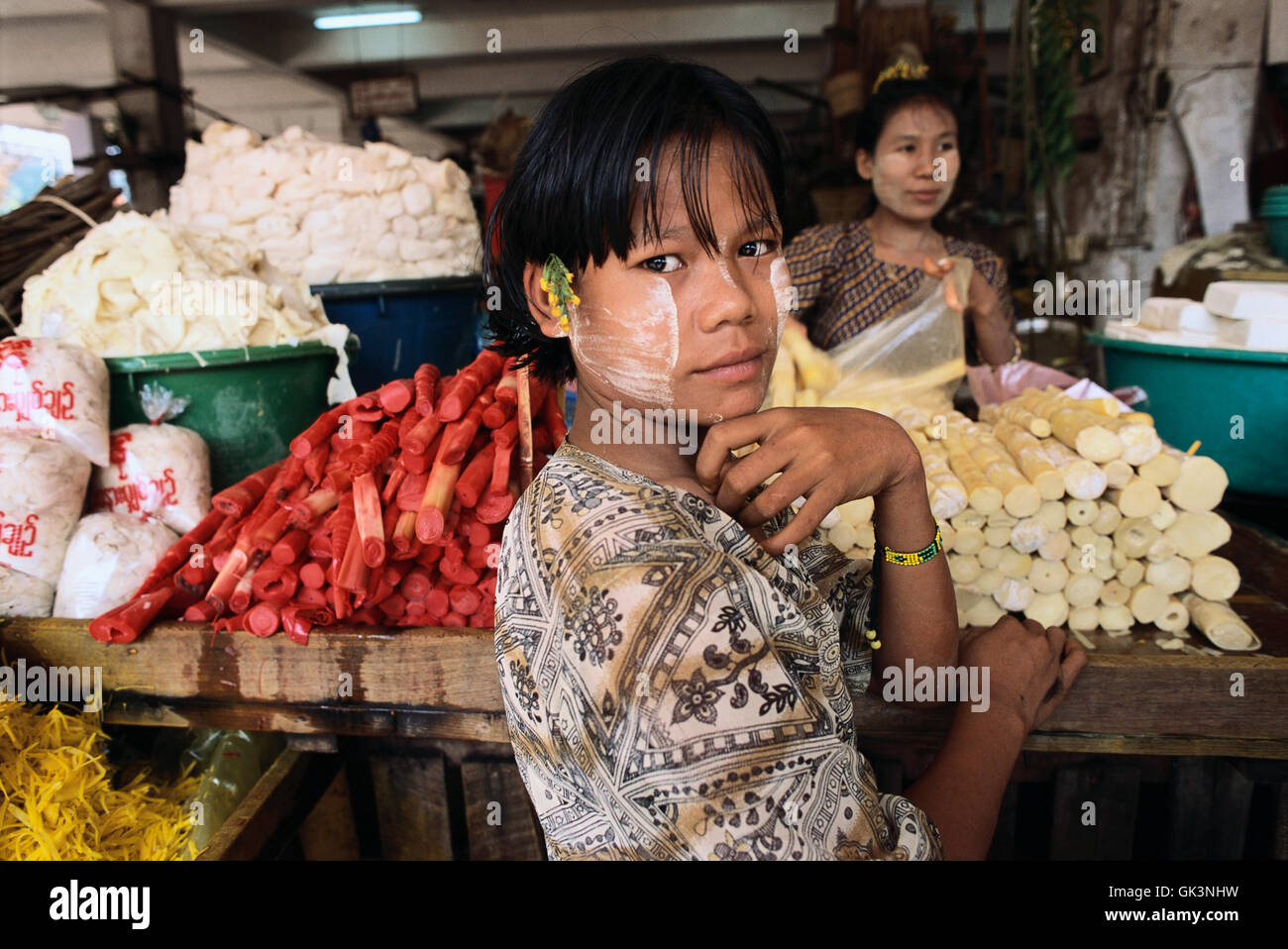 ca. 2003, Yangon, Burma --- Market Trader with Lightened Skin --- Image ...