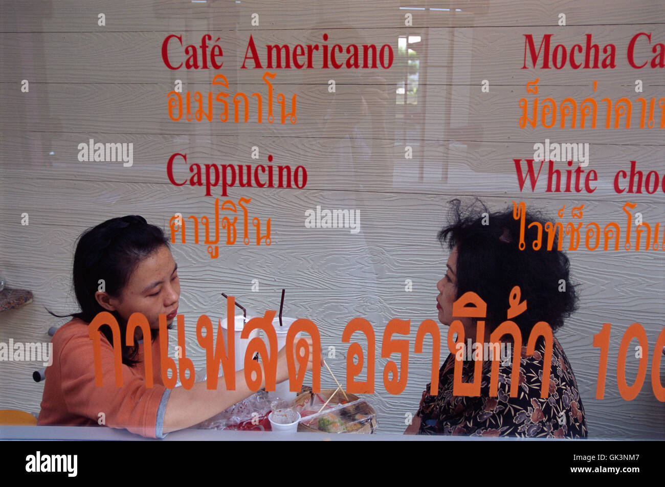 Two women sign language hi-res stock photography and images - Alamy