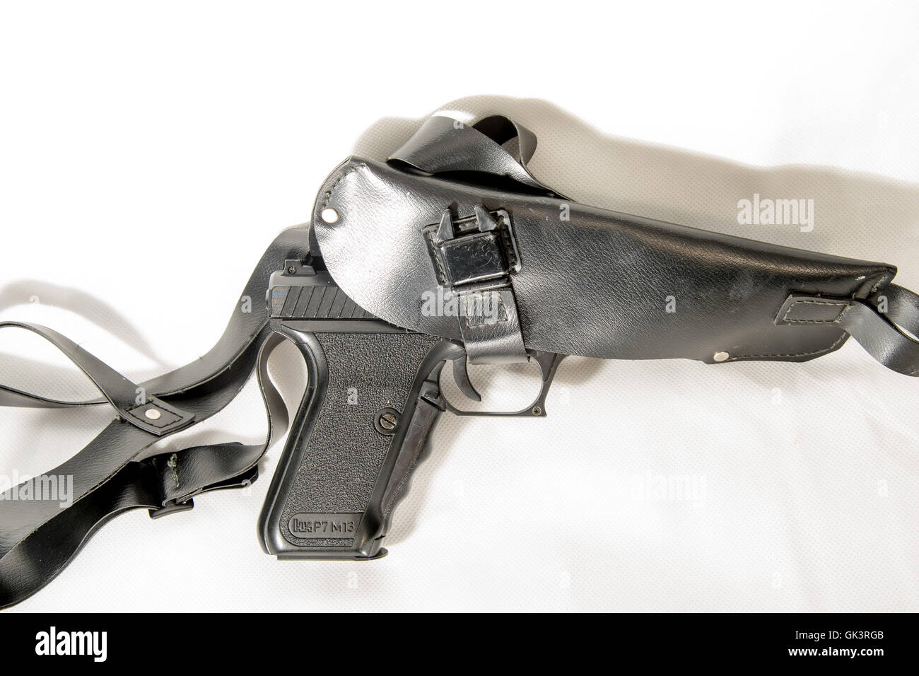 Replica Handgun in a shoulder holster Stock Photo - Alamy