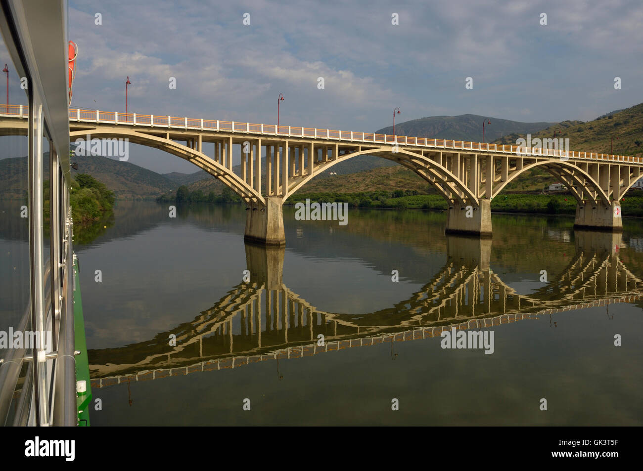 River boat cruise by the road bridge at Barca d'Alva , Douro Valley ...
