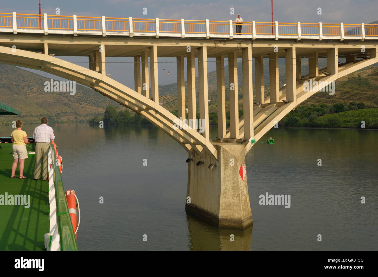 River boat cruise by the road bridge at Barca d'Alva , Douro Valley ...