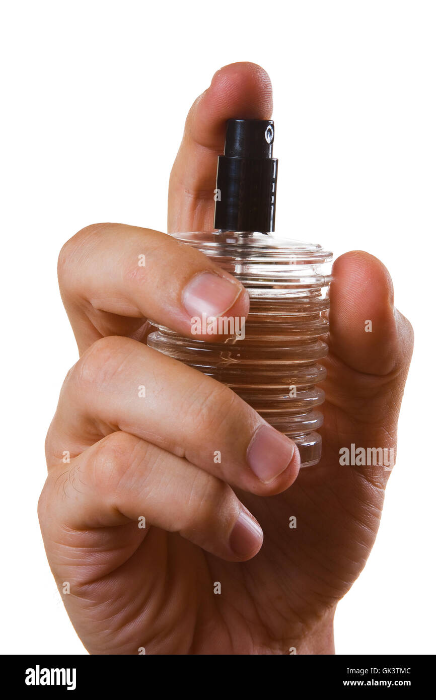bottle of cologne in his hand Stock Photo - Alamy