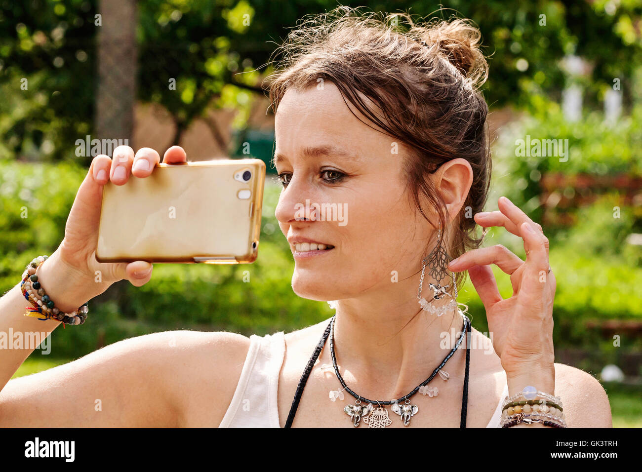 Young woman having fun cell hi-res stock photography and images - Alamy
