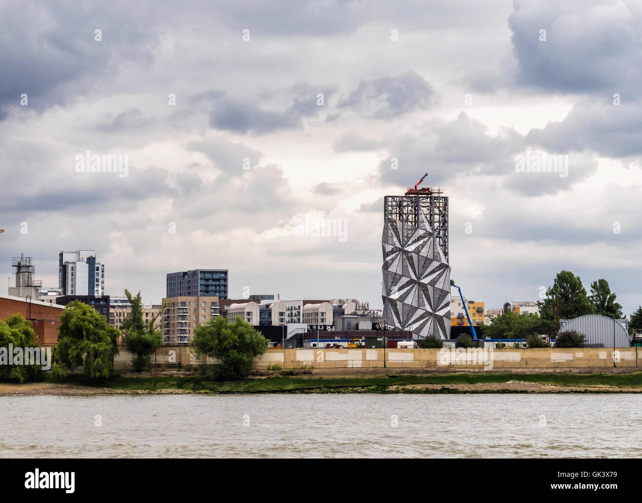 New Thames riverside apartment buildings of new-build development under ...