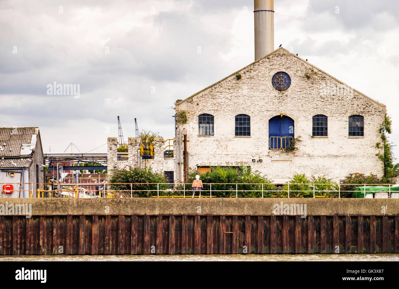 Old riverside warehouse on Thames river, Silvertown, North Greenwich ...
