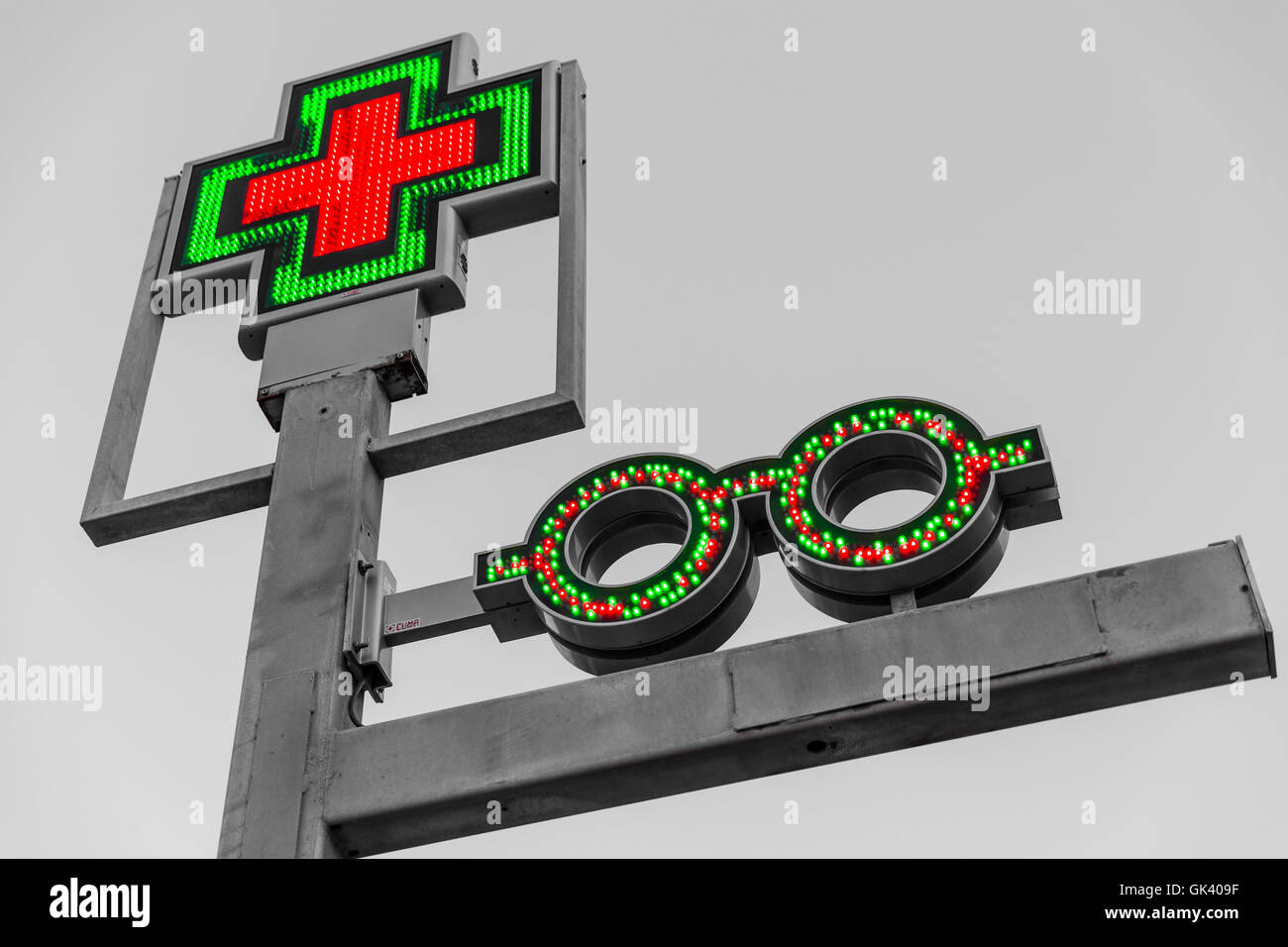 Pharmacy sign with blinking cross Stock Photo - Alamy