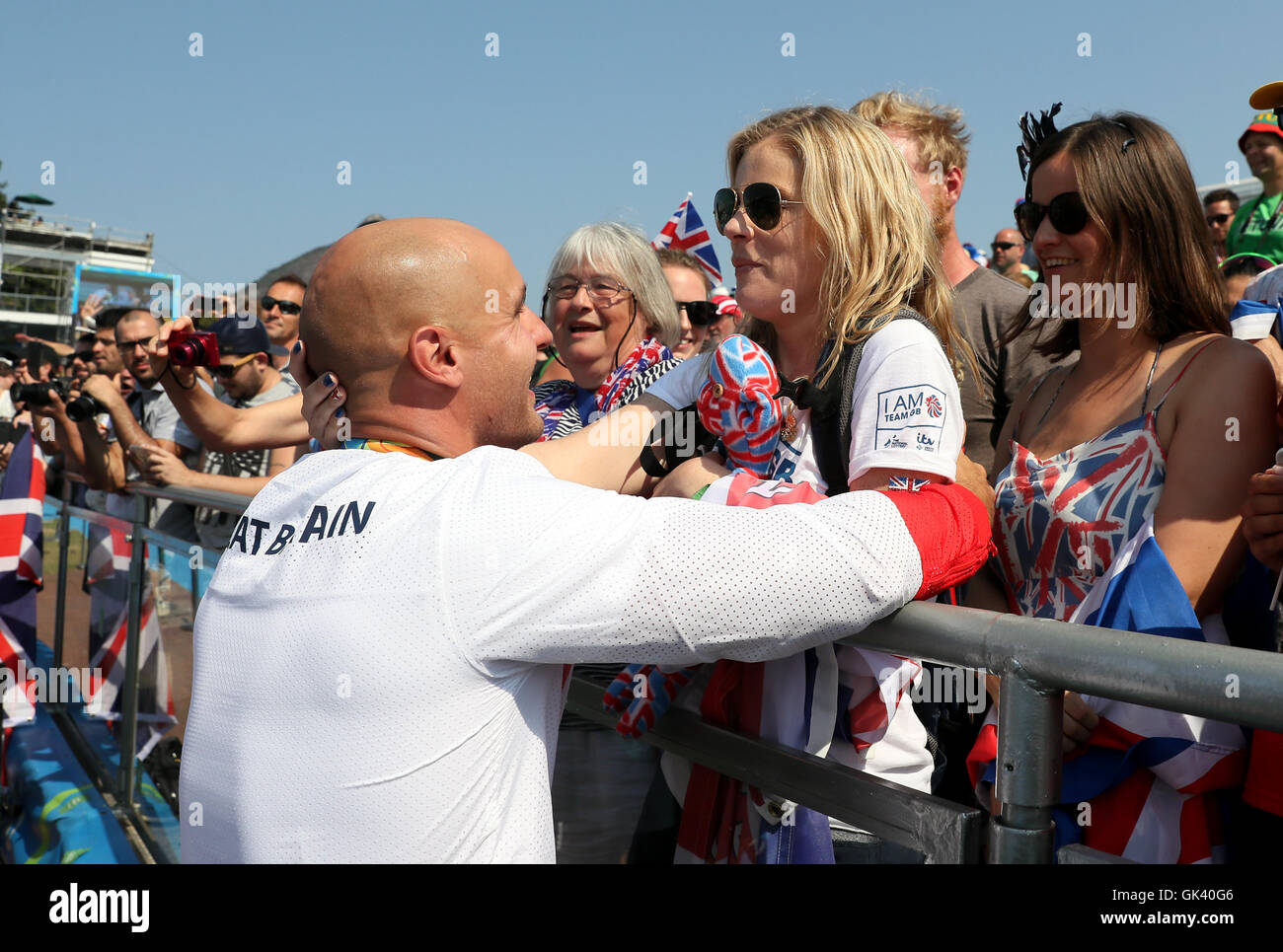 Great Britain's Liam Heath celebrates with wife Em Heath after winning ...