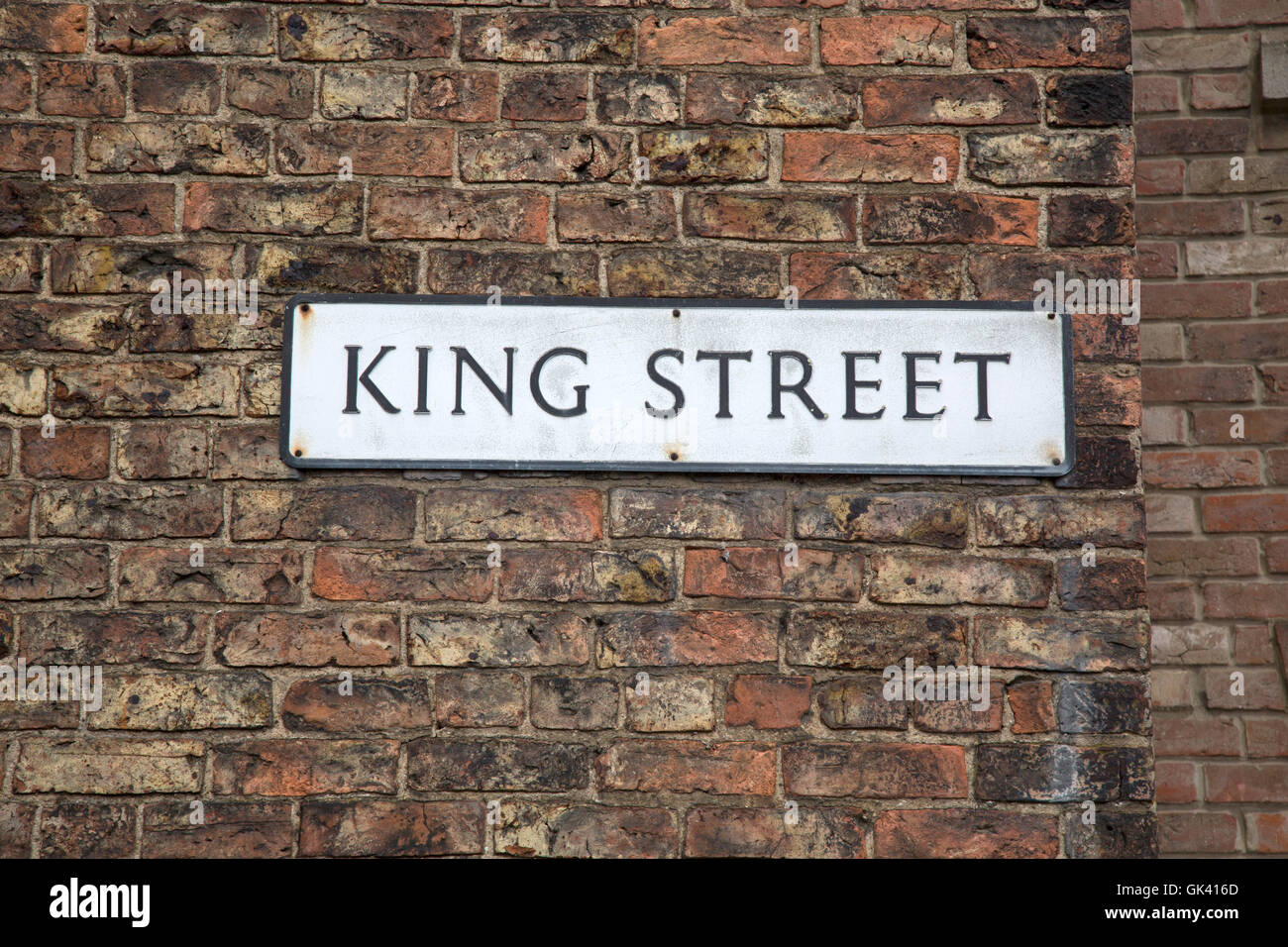 King Street Road Sign on Brick Wall Stock Photo - Alamy