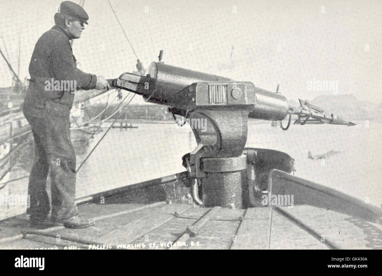 This image shows a whaling gun with an attached harpoon. The harpoon is ...