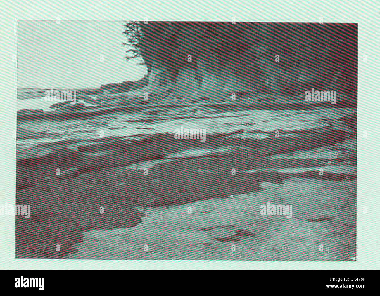 The image depicts cliffs with a seaward platform extending into the ocean. This natural feature ...