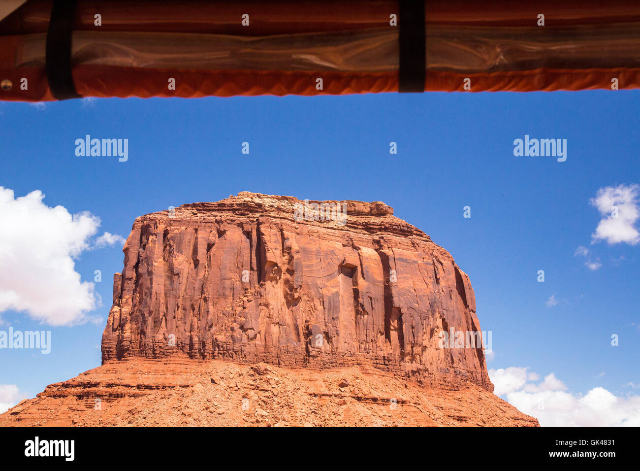 Monument Valley butte seen through open coach window Stock Photo - Alamy