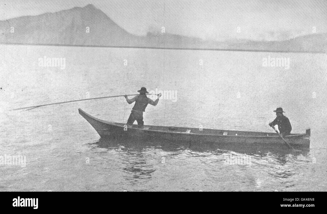 An Indian sealing canoe demonstrates the traditional method of throwing ...