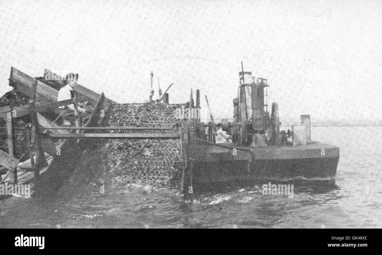 The kelp harvester is depicted from the end view, showing the cutting ...