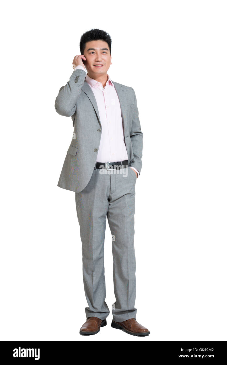 Studio shot business man calling Stock Photo - Alamy