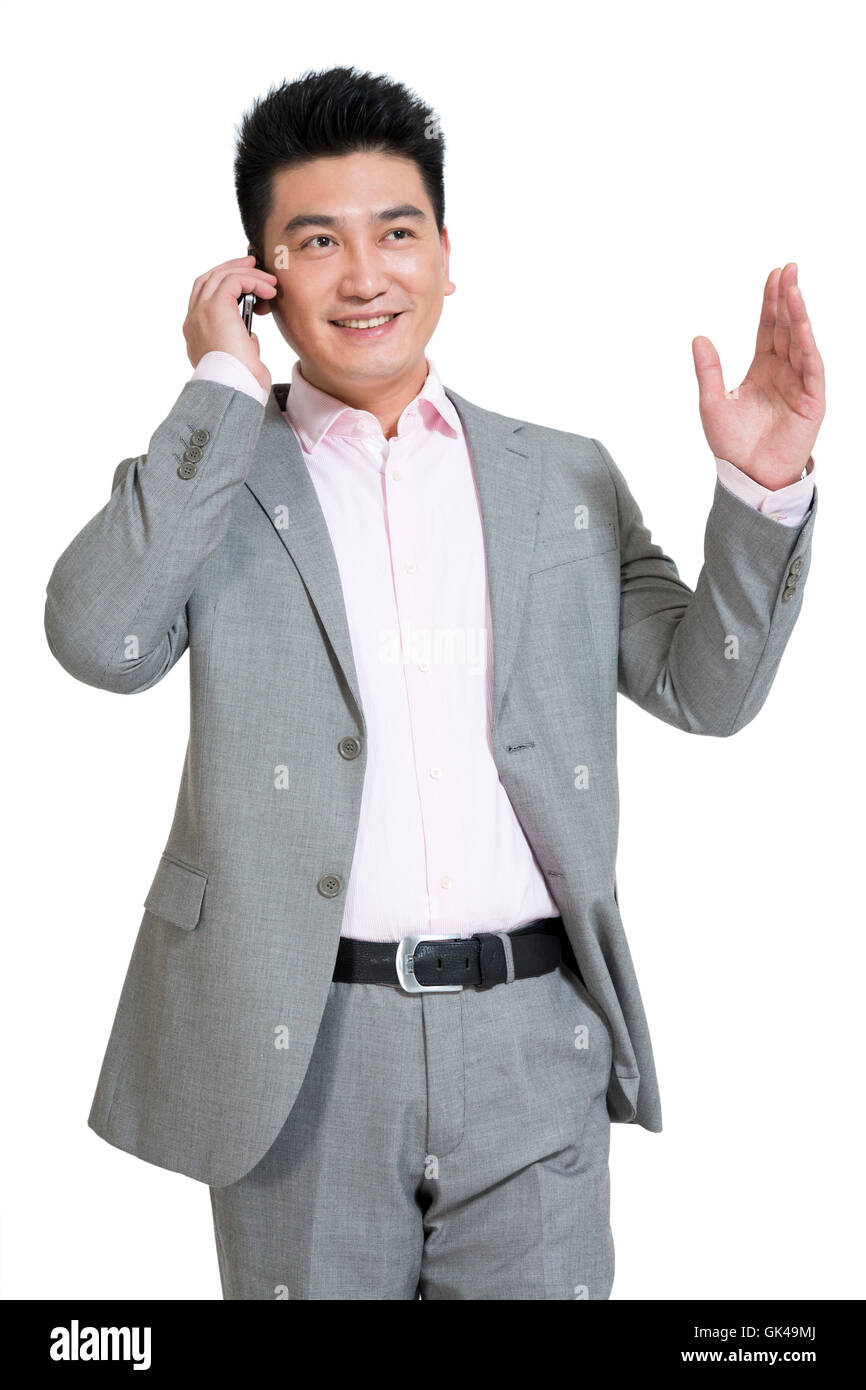 Studio shot business man calling Stock Photo - Alamy
