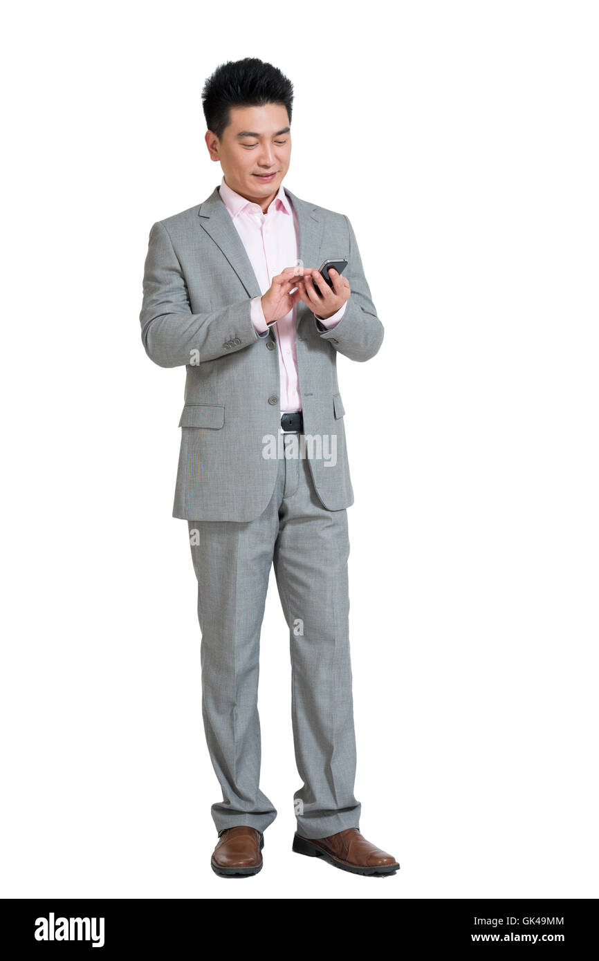 Studio shot business man calling Stock Photo - Alamy