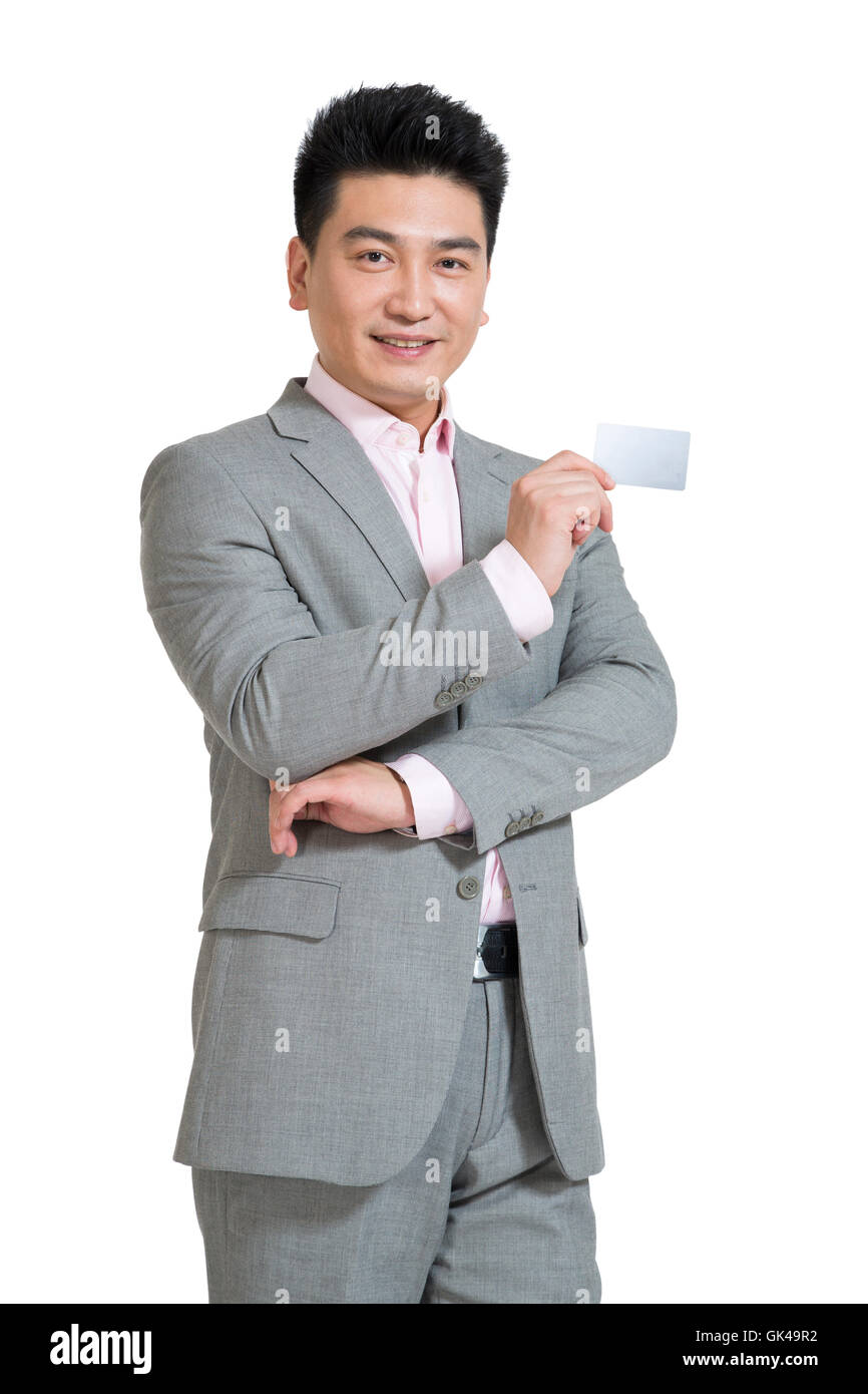 Studio shot business man show card Stock Photo - Alamy