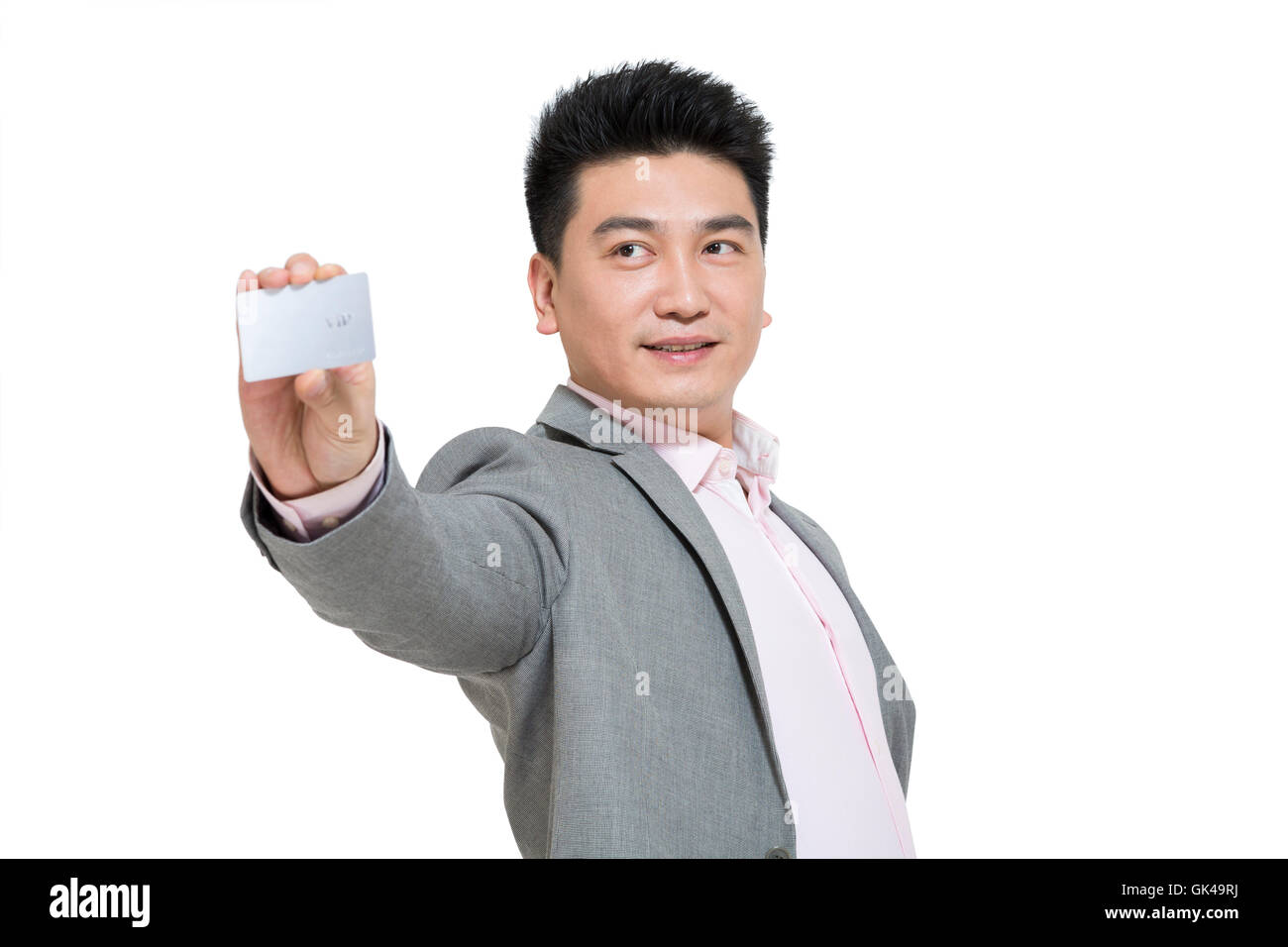 Studio shot business man show card Stock Photo - Alamy