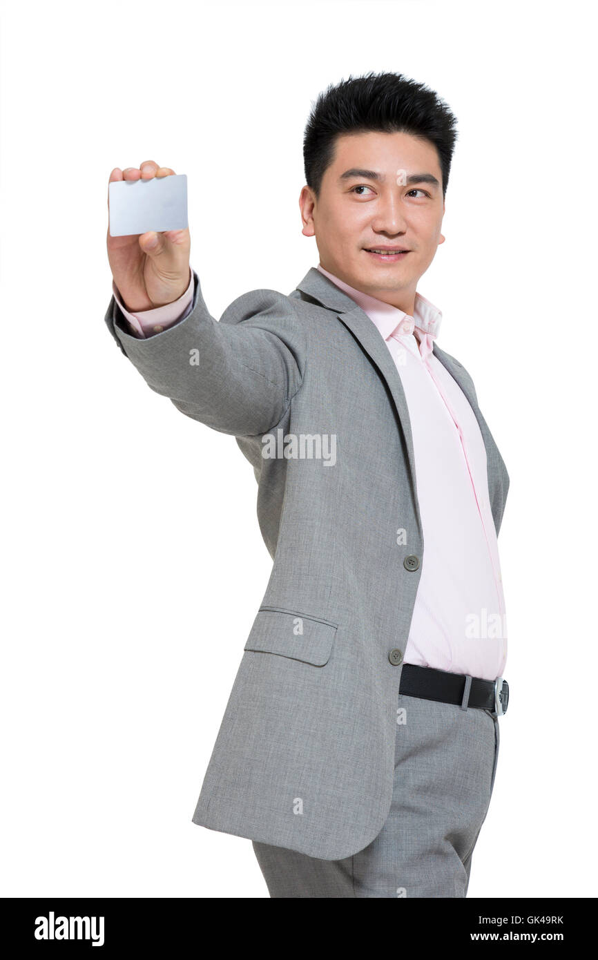 Studio shot business man show card Stock Photo - Alamy