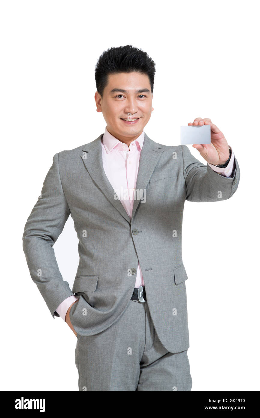 Studio shot business man show card Stock Photo - Alamy