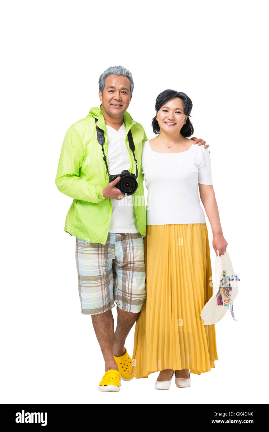 Elderly couple walking hand in hand Cut Out Stock Images & Pictures - Alamy