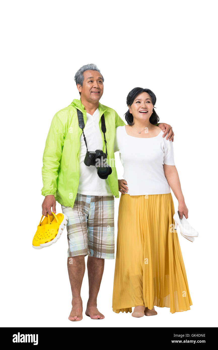 Elderly couple walking hand in hand Cut Out Stock Images & Pictures - Alamy