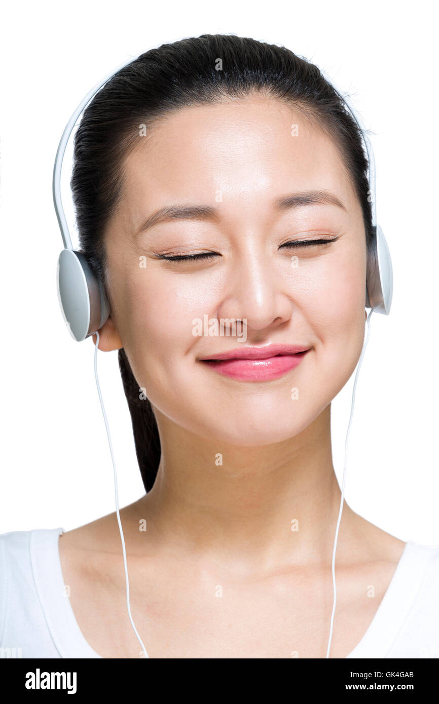 Studio shot young woman's facial expressions Stock Photo - Alamy