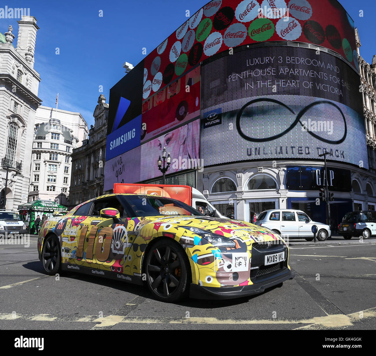 An emoji wrapped Nissan GT R competes in the 2016 Gumball 3000 in ...